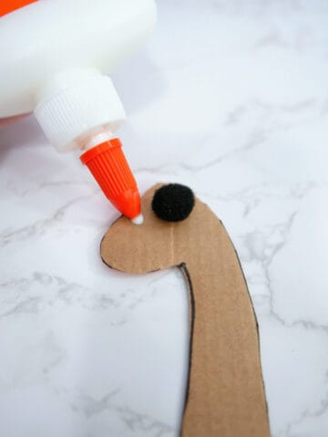 Pom Pom Dinosaur Craft - Made with HAPPY - Easy Kids Craft Ideas